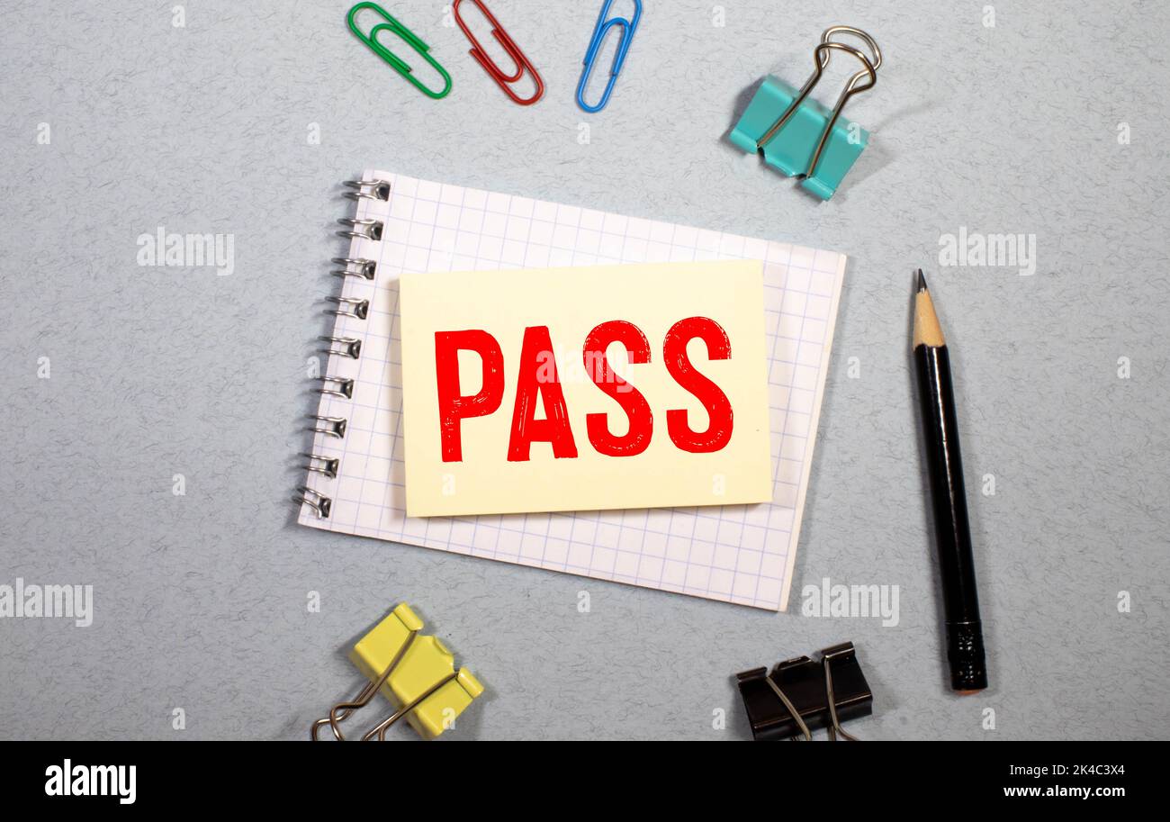 PASS, word on the card shown by a man, vintage tone Stock Photo - Alamy