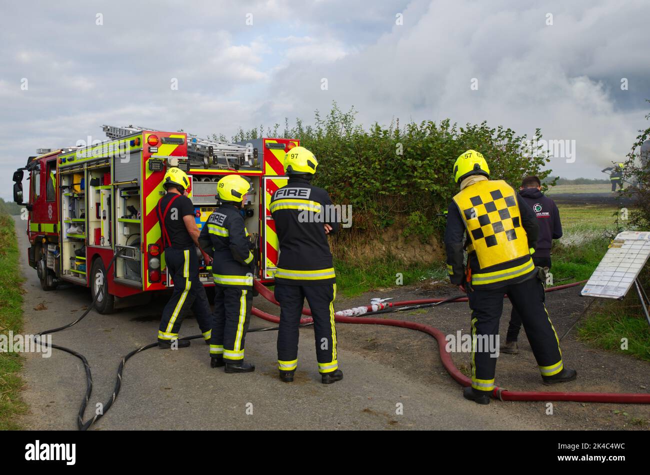 Firefighters working to put the blaze out Stock Photo - Alamy Firefighters working to put the blaze out Stock Photo - Alamy