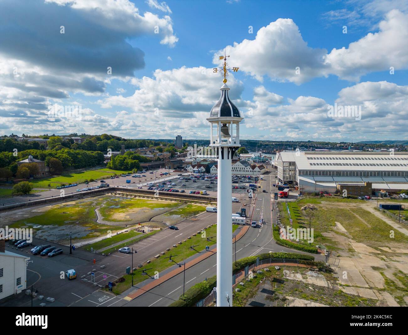 The Bell Mast at Chatham Dock with a cloudy sky Stock Photo - Alamy