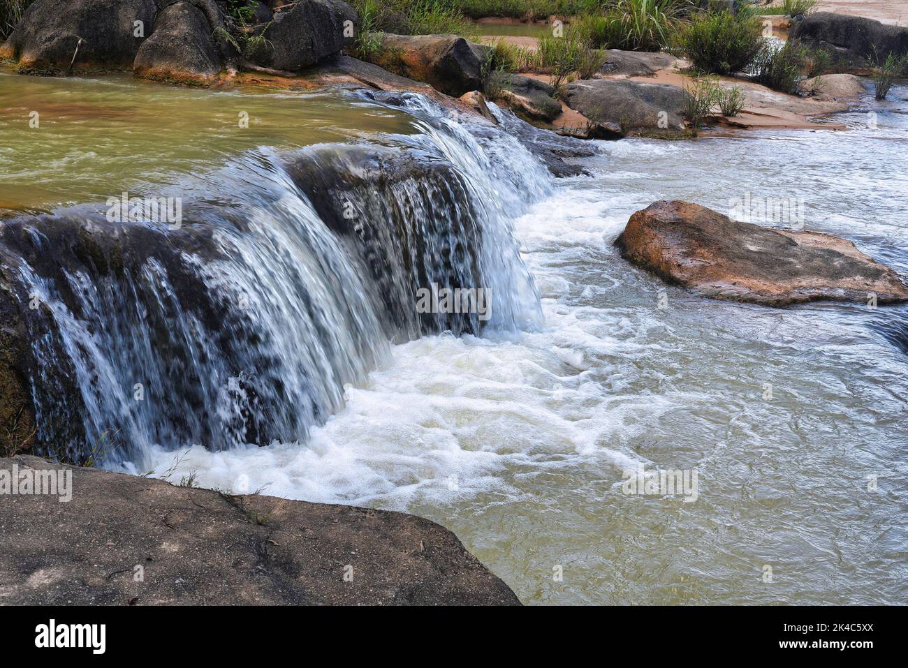 Small waterfall with clear water closeup in Young Bay in Vietnam Stock ...