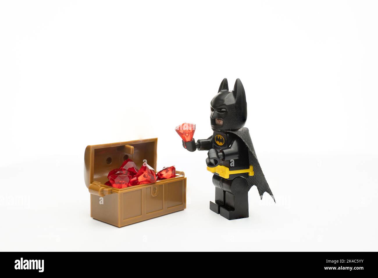 The Batman gets a diamond from a case full of diamonds stock ...