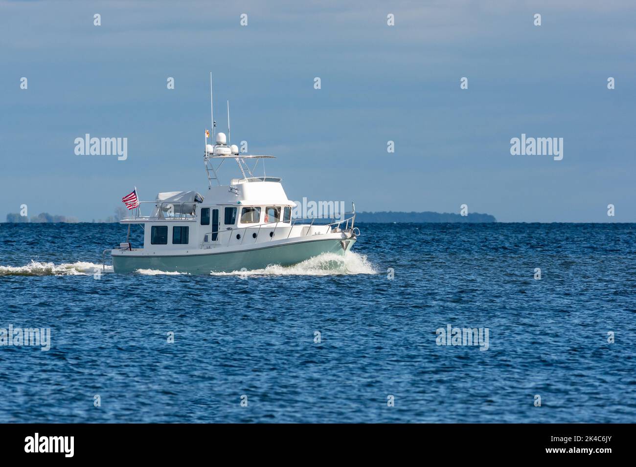 A large boat cruising on the water Stock Photo - Alamy