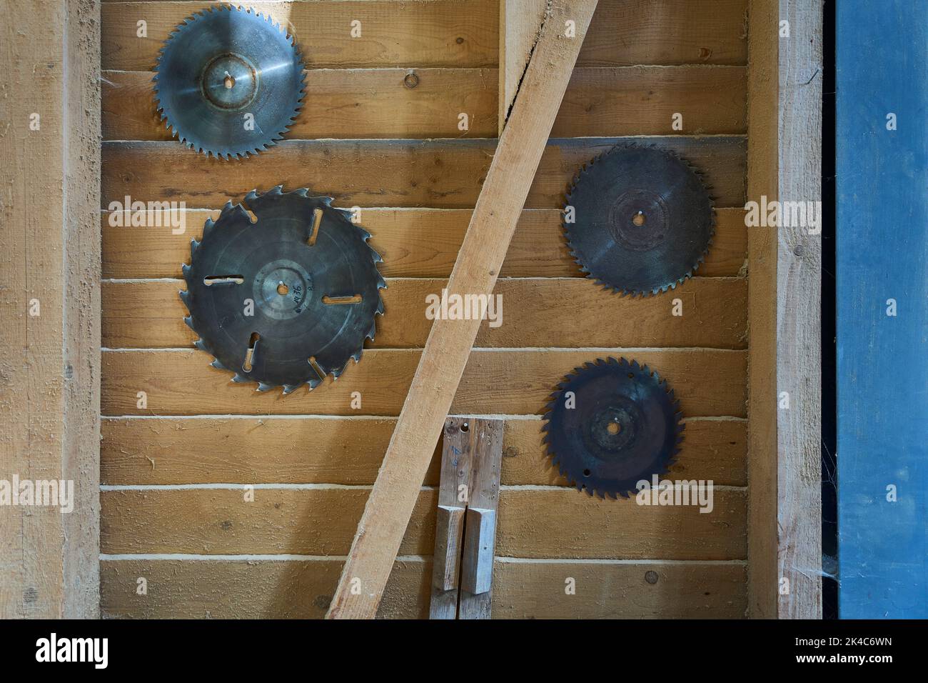 Some tools and details in a old sawmill Stock Photo - Alamy