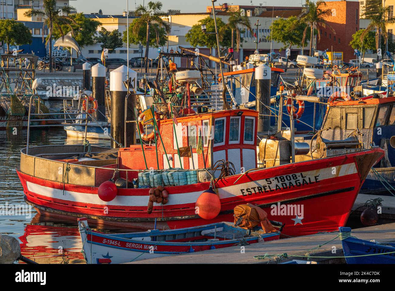 A Sunset at the fishing port of Setubal in the city of Setubal ...