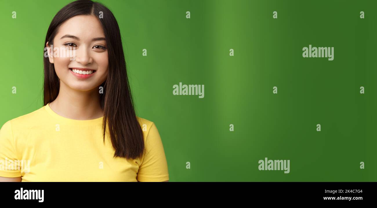 Optimistic cute carefree asian girl taking care skin condition, smiling ...