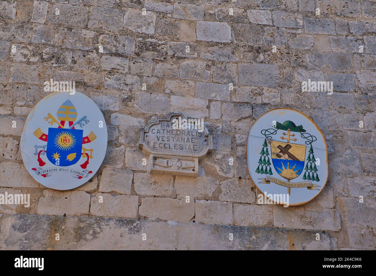 A closeup of the coats of arms on the walls of Vieste Cathedral in ...