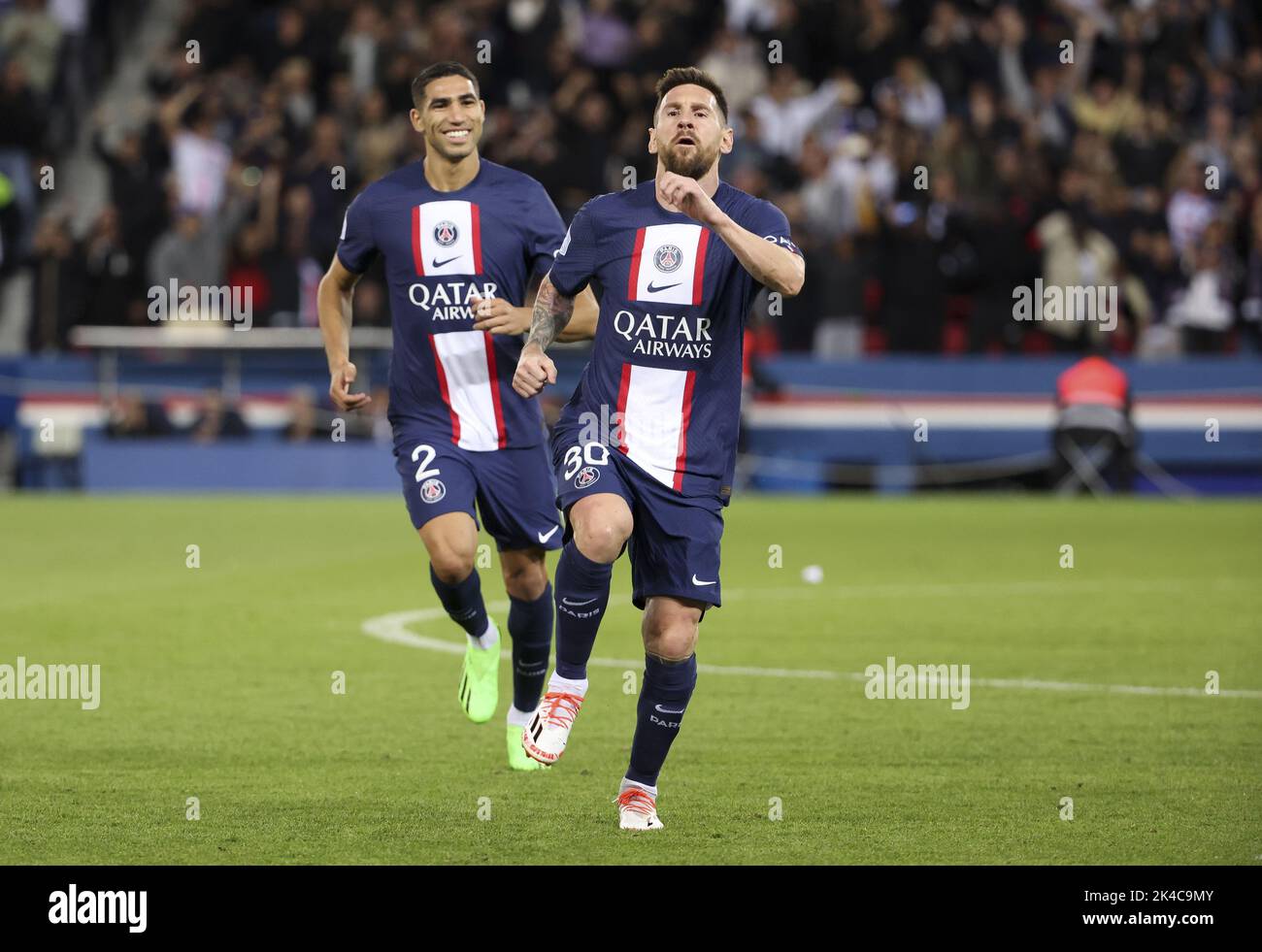 Lionel Messi of PSG celebrates his goal with Achraf Hakimi (left ...