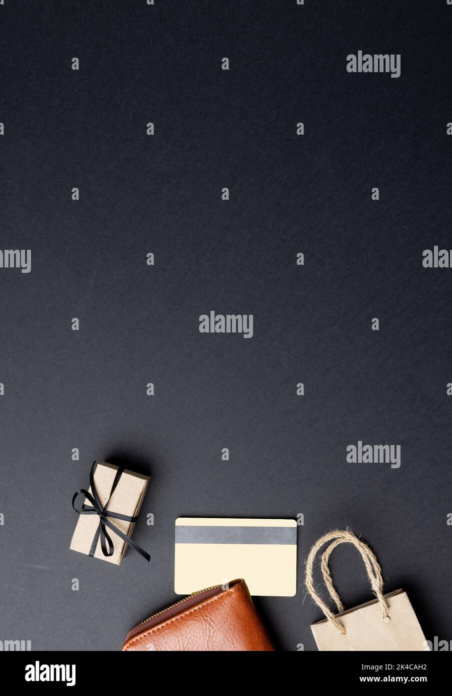 Composition of credit card, wallet, present and bag with copy space on ...