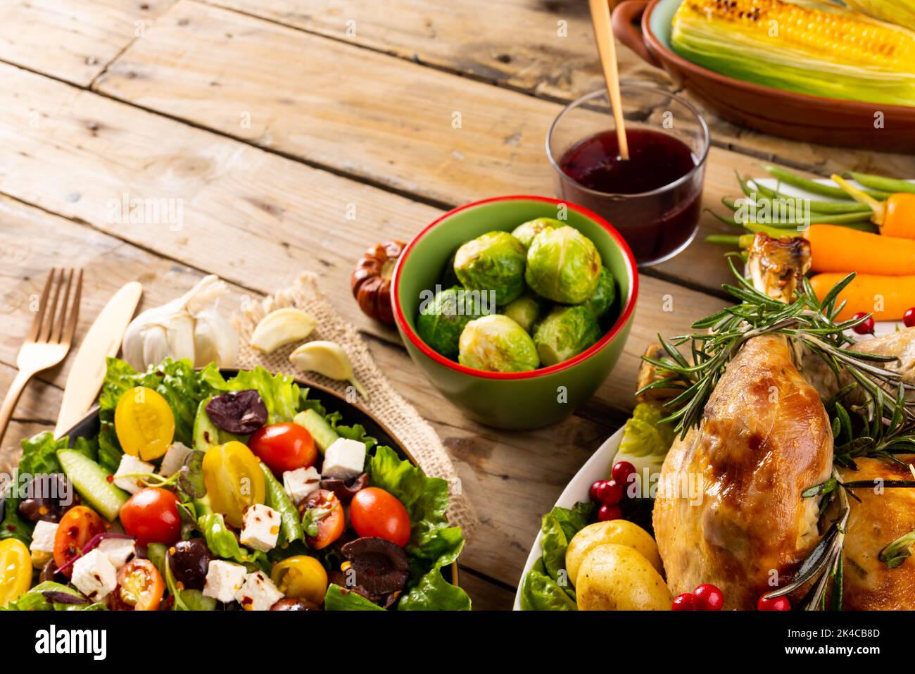 Overhead view of thanksgiving table roast turkey, vegetables and copy ...