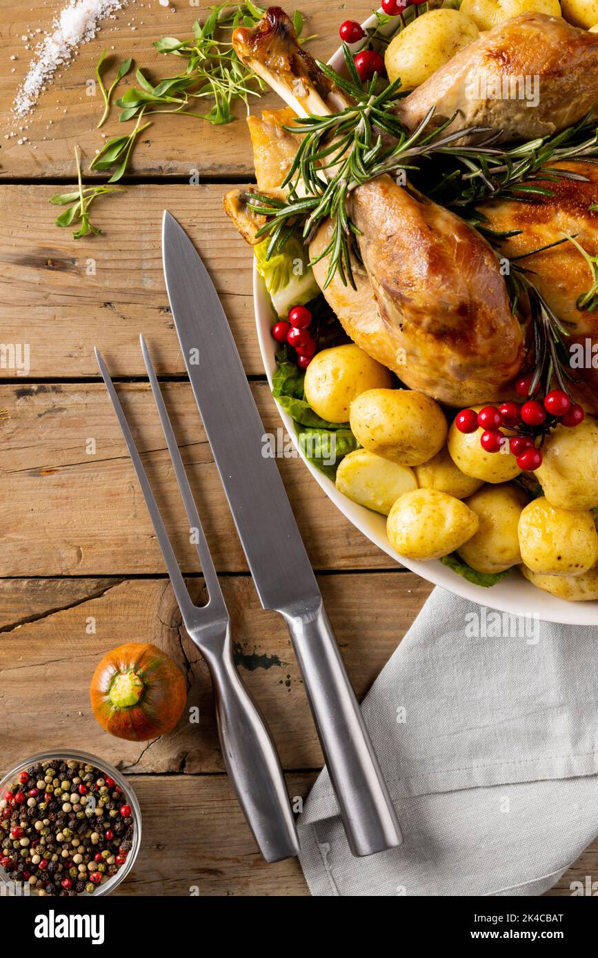 Overhead view of thanksgiving table with roast turkey, potatoes and ...