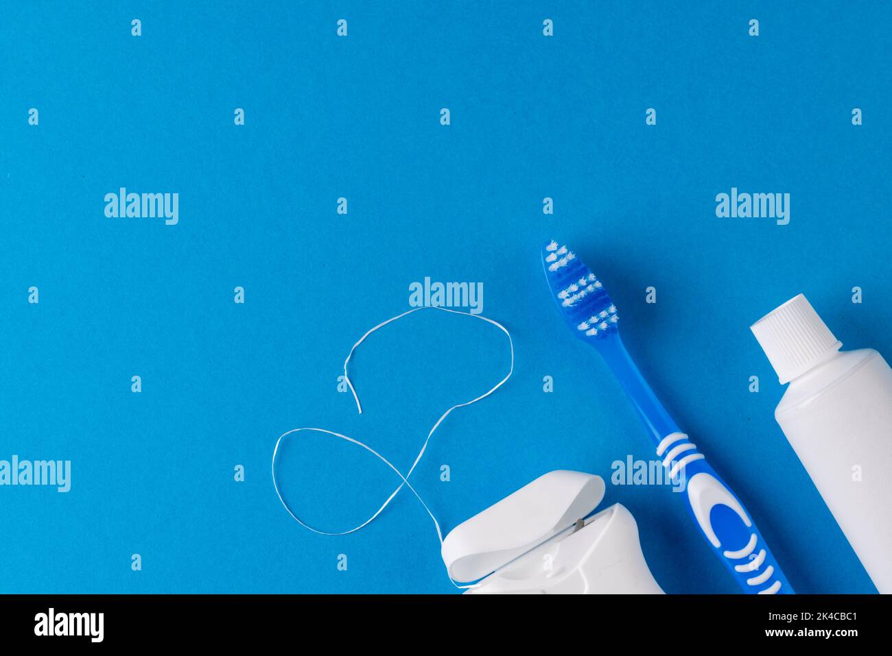 Toothbrush toothpaste blue background hi-res stock photography and ...