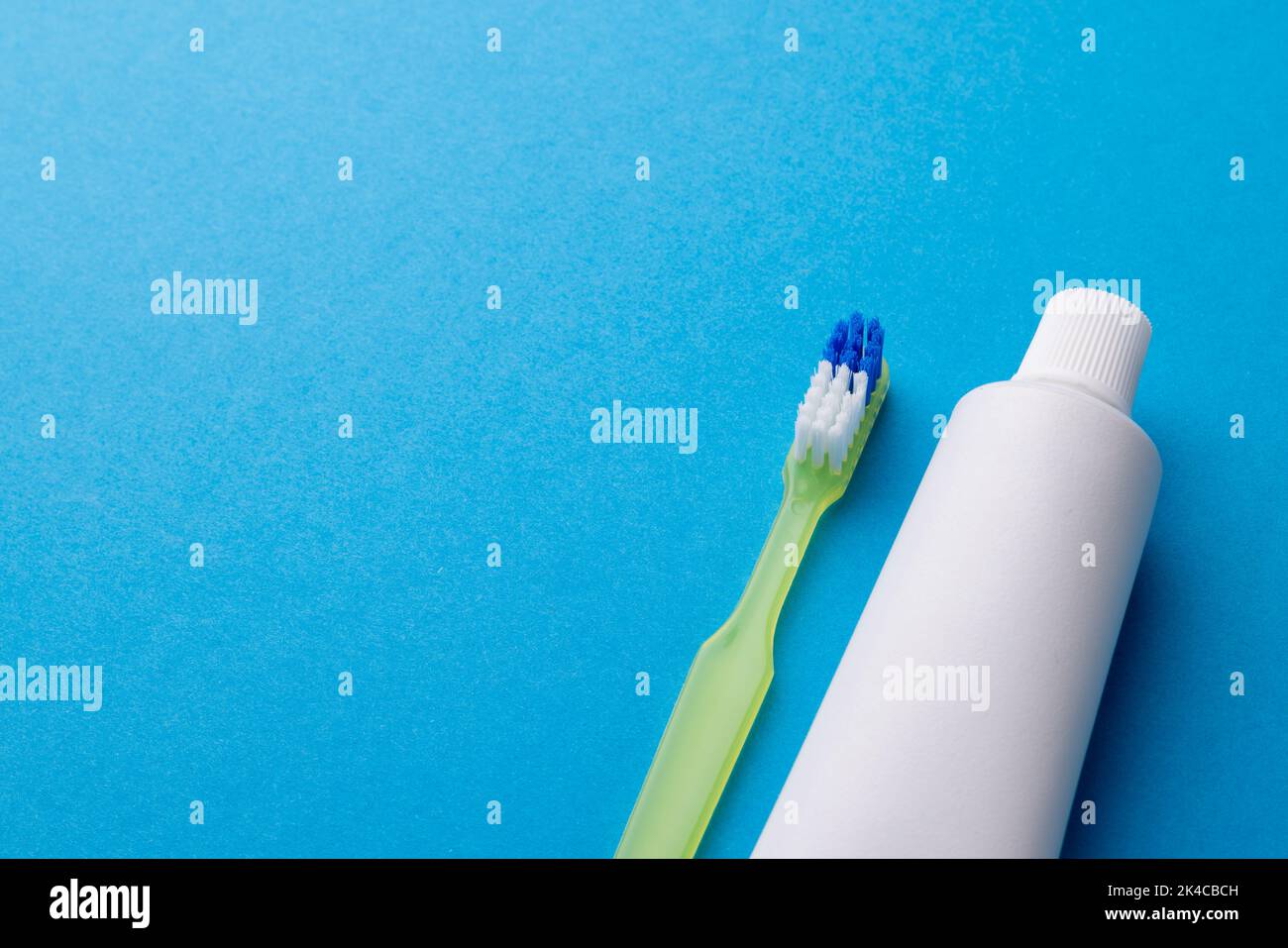 Toothbrush toothpaste blue background hi-res stock photography and ...