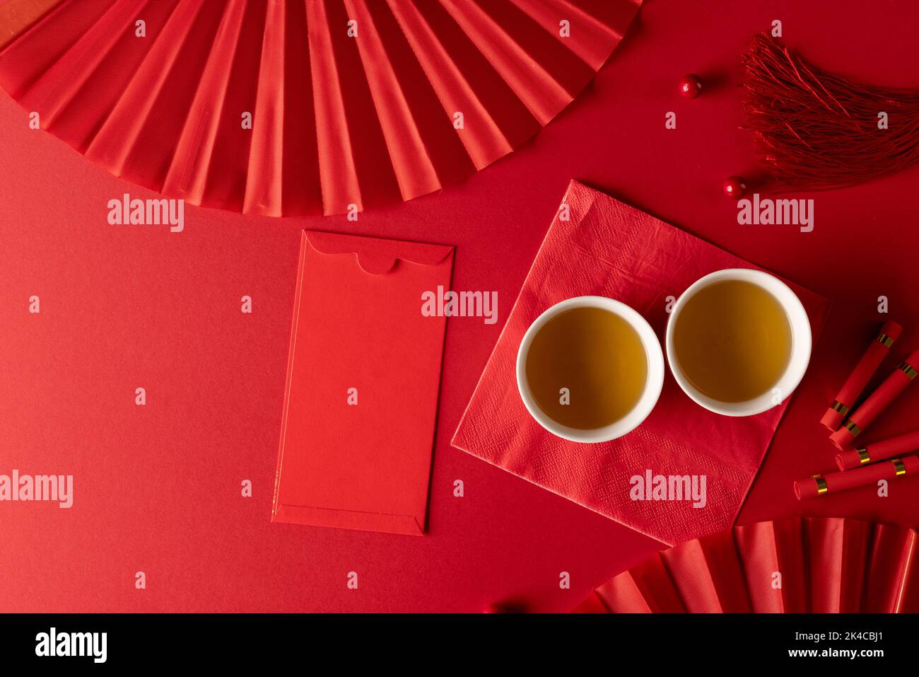 Composition of traditional chinese decorations and fans on red ...