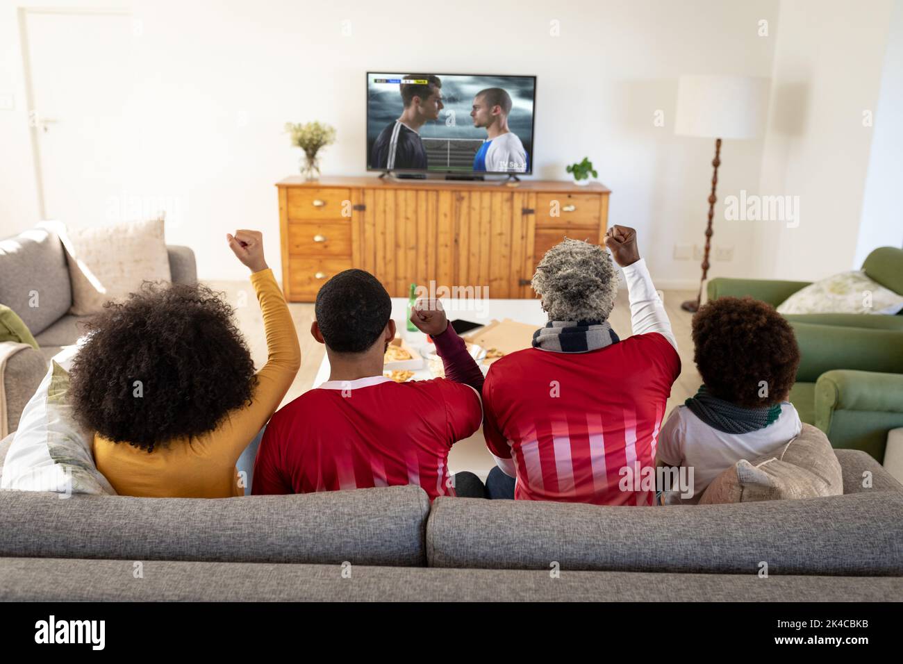 Black Family Watching Tv Together