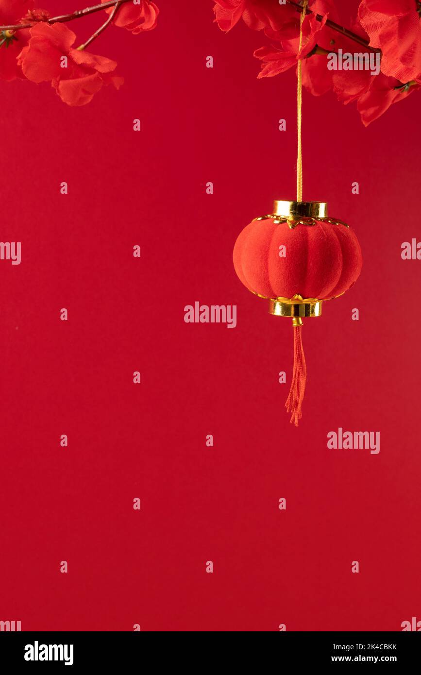 Composition of red chinese decoration on red background Stock Photo - Alamy