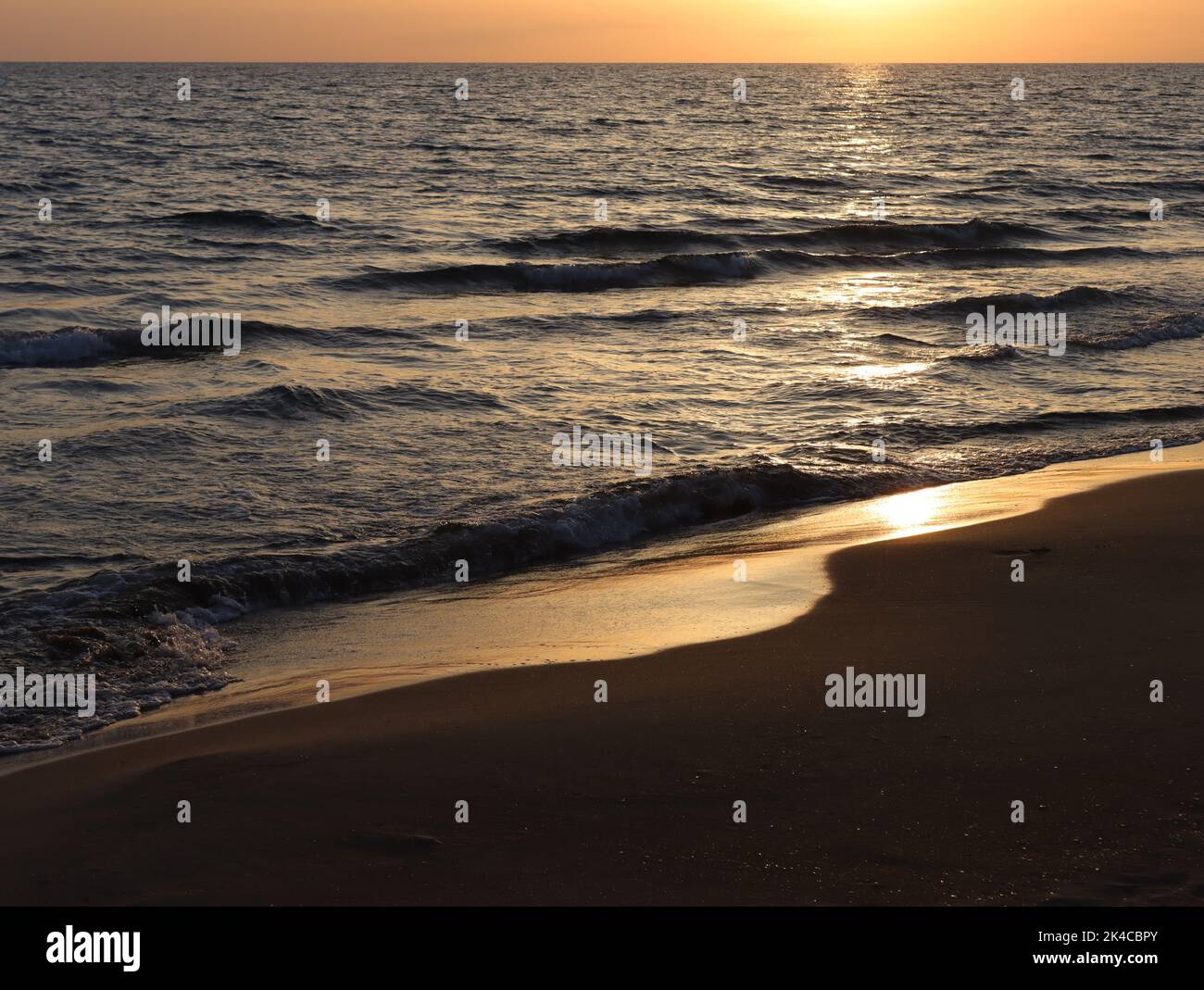 A dramatic red sunset over the sea Stock Photo - Alamy