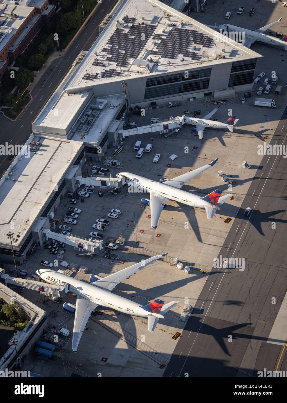 The Delta Airlines planes waiting at the gate in Boston for passengers ...