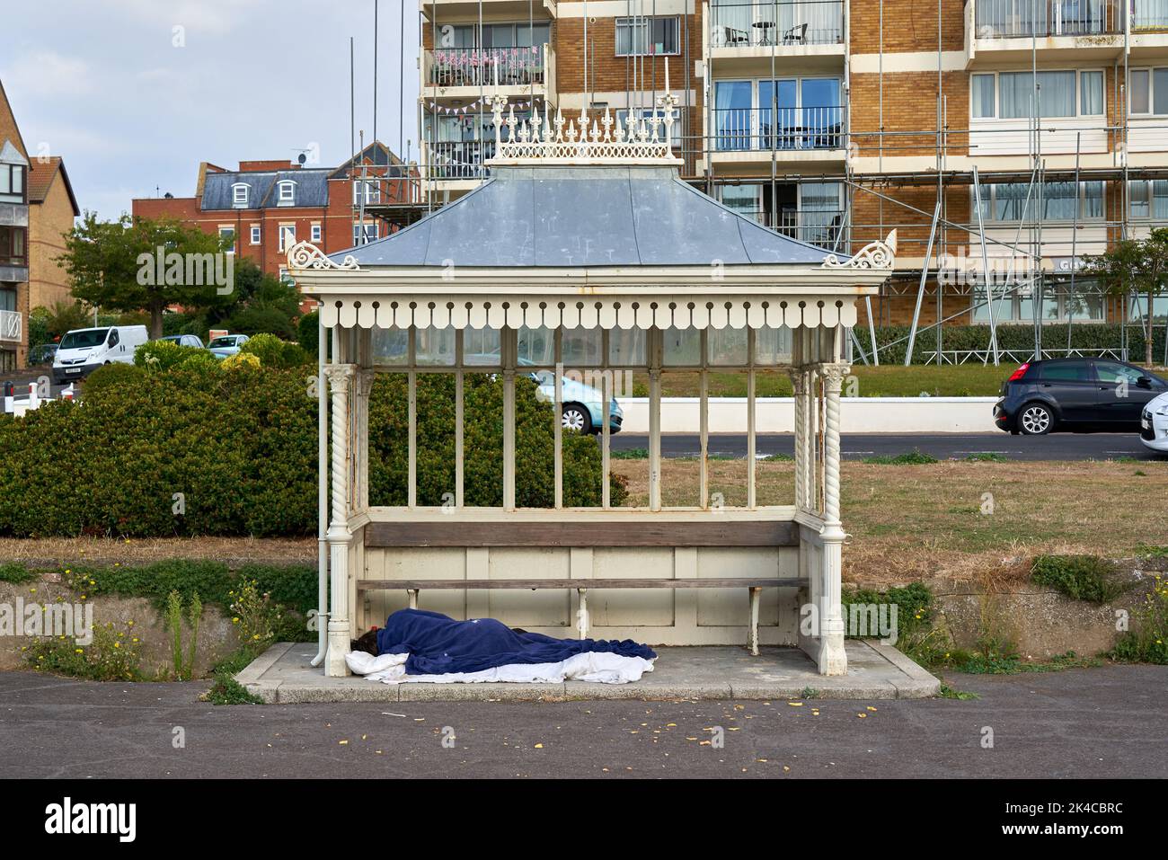 A homeless person in a seafront shelter on Victoria Promenade in ...