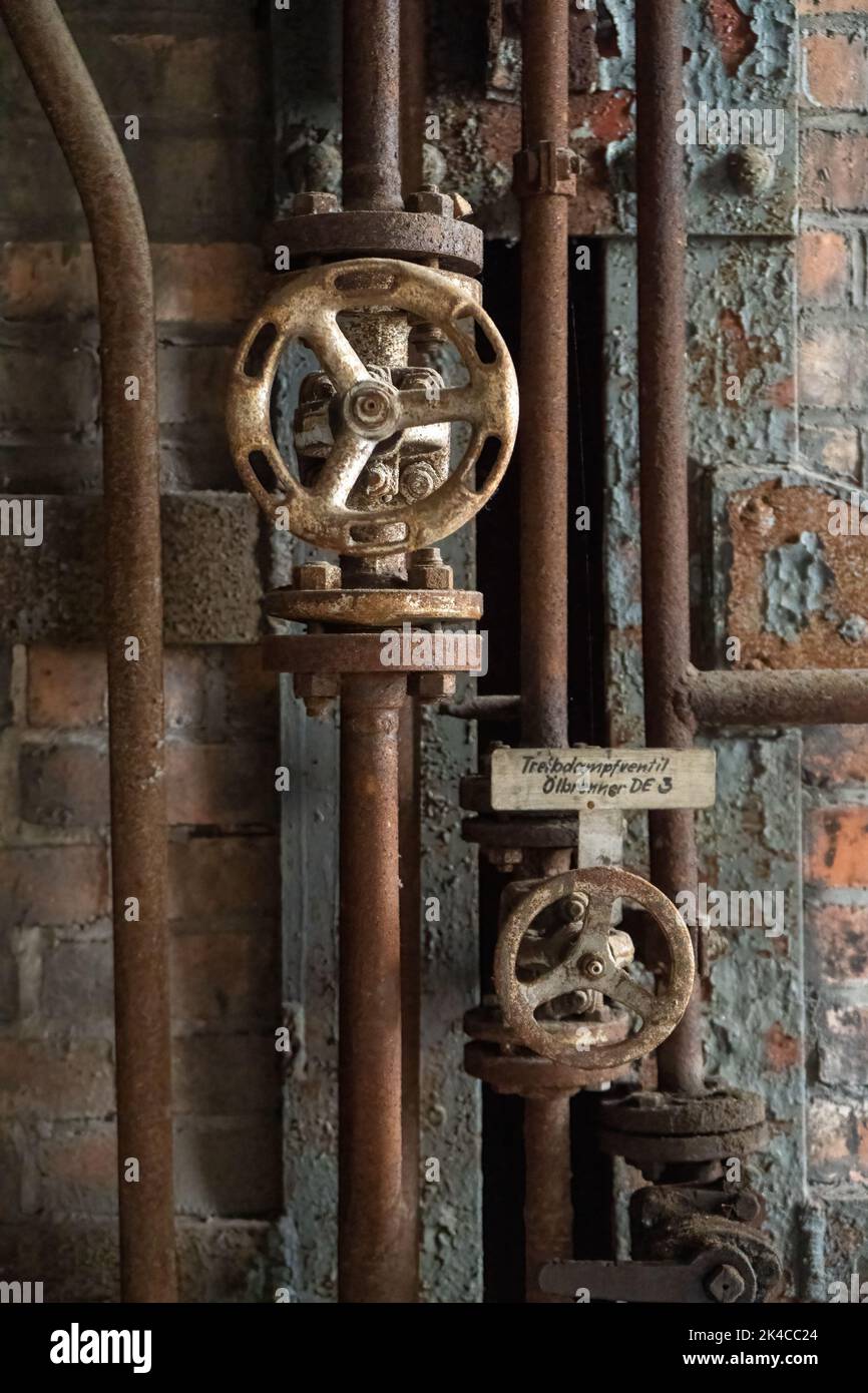 Rusty details of valves and pipes Stock Photo - Alamy