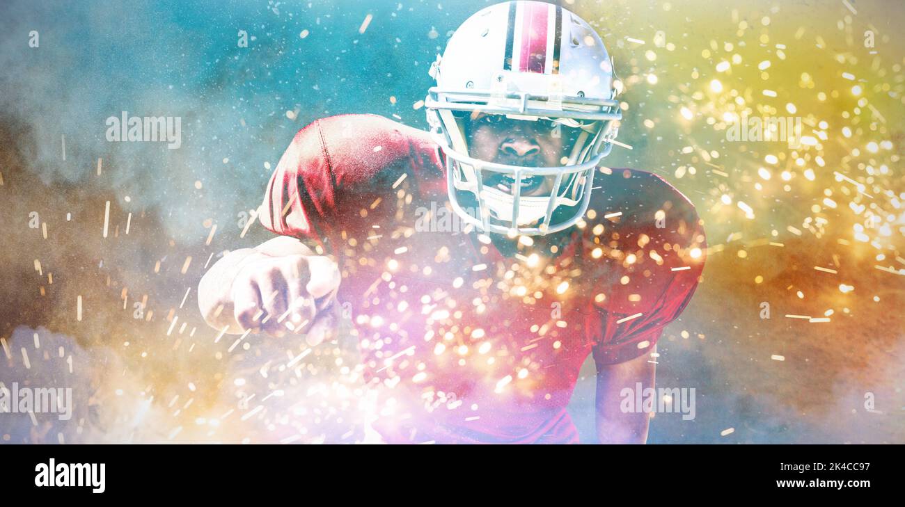 American Football Player against splashing of powder Stock Photo - Alamy