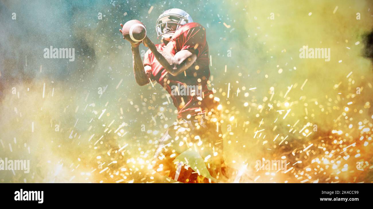 American Football Player against splashing of powder Stock Photo - Alamy