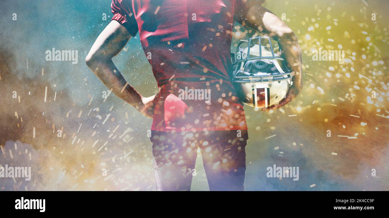 American Football Player against splashing of powder Stock Photo - Alamy