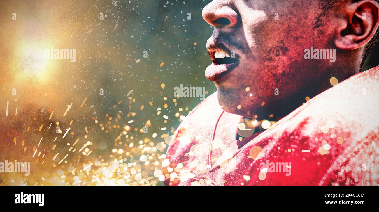 American Football Player against splashing of powder Stock Photo - Alamy