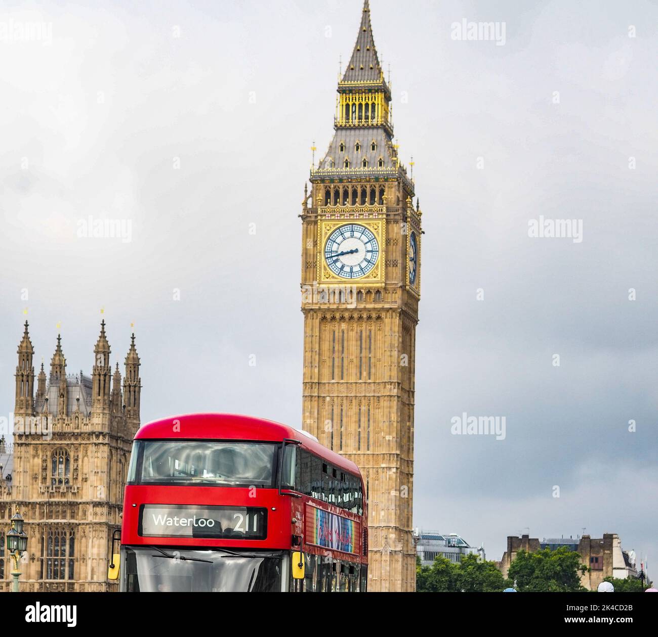 A beautiful shot of a red bus with Big Ben in the background Stock ...