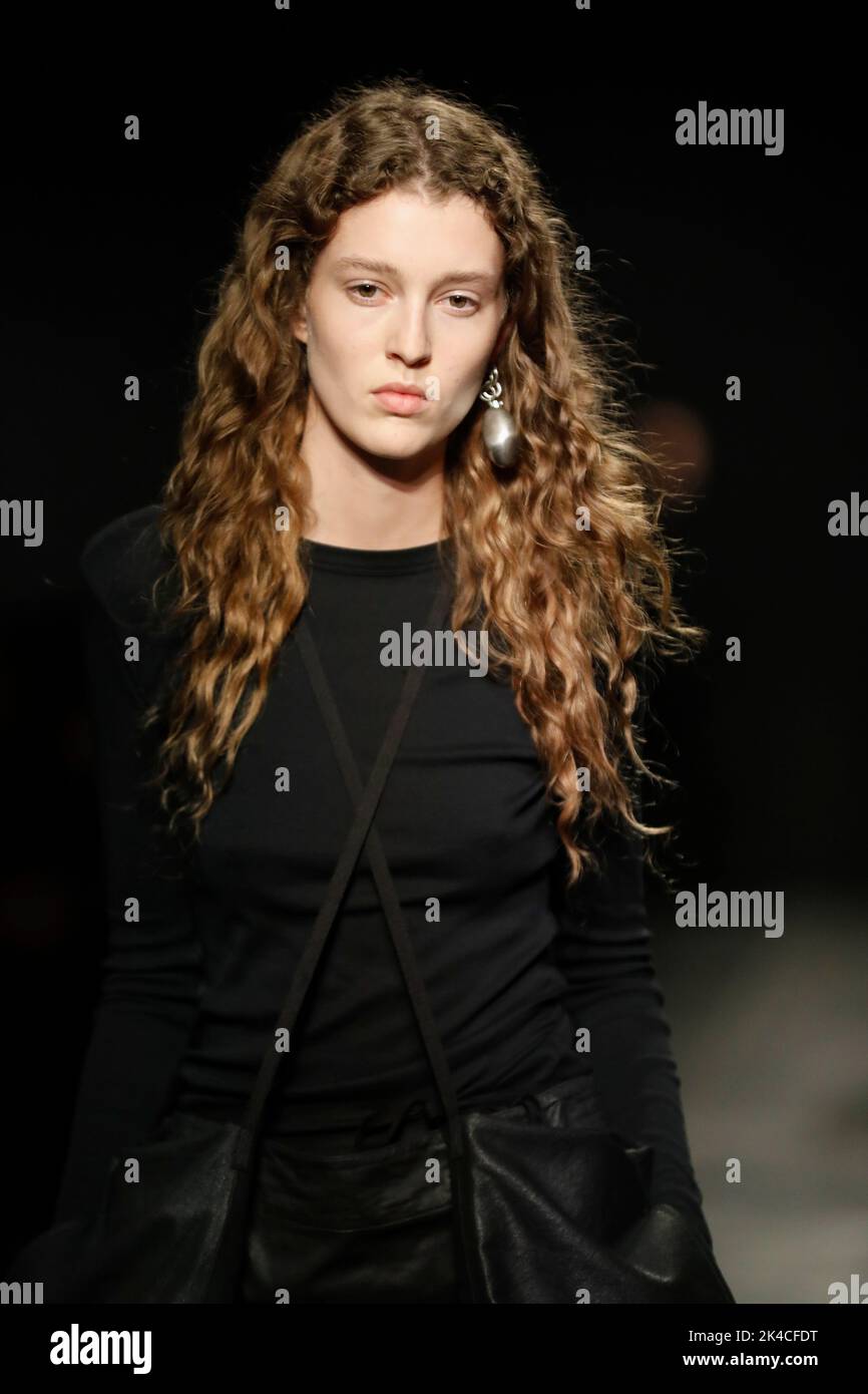 Model Stinne Trappeniers walks on the runway at the Ann Demeulemeester ...