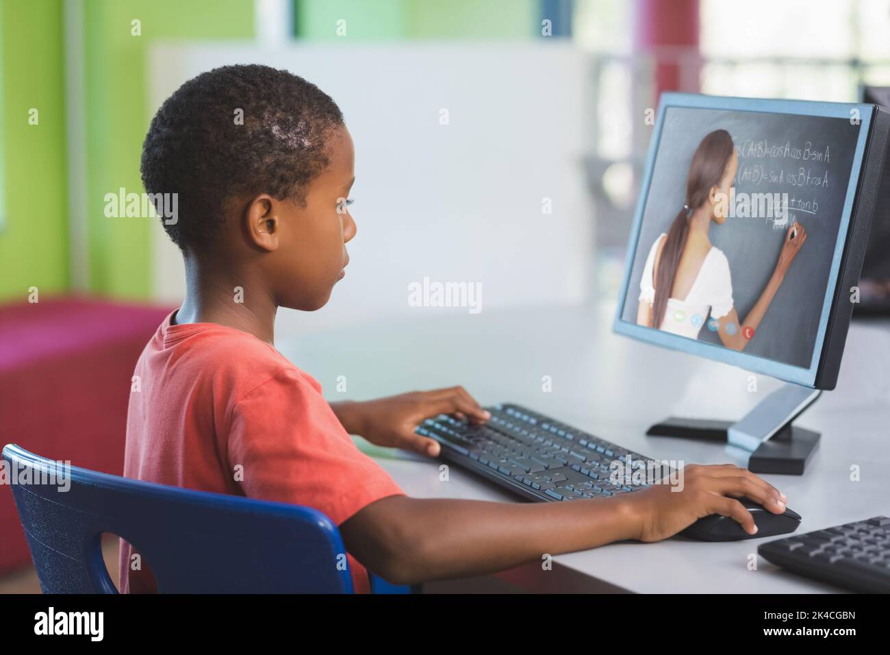 Male african american student having a video call with female teacher ...