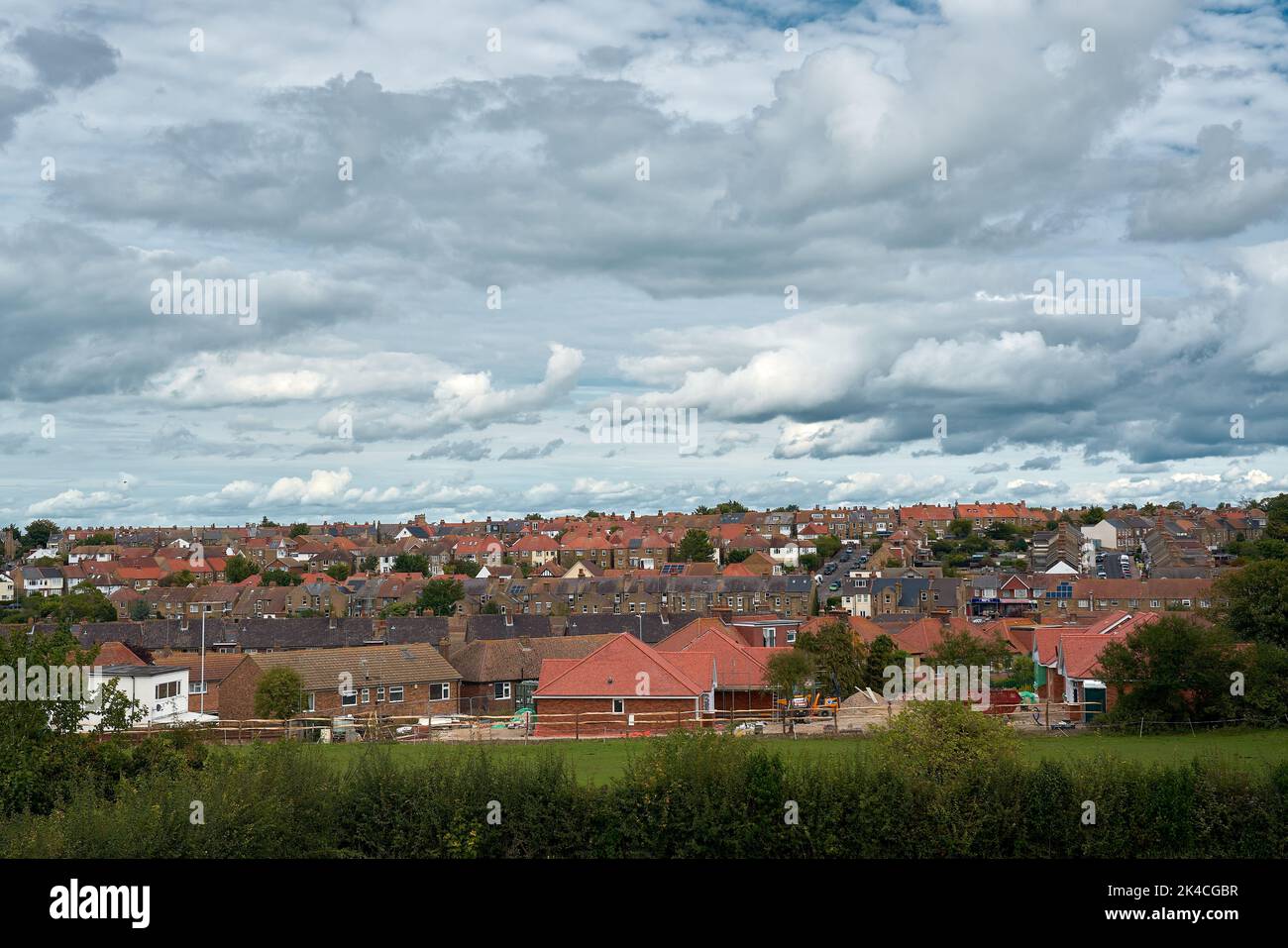 A cityscape over the Dane Valley area of Margate in Kent under a cloudy ...