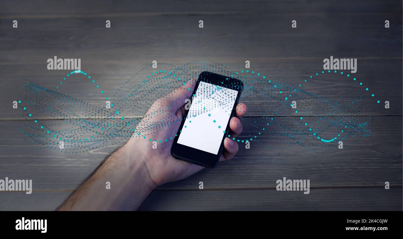 Composition of dna strand over person using smartphone with blank ...