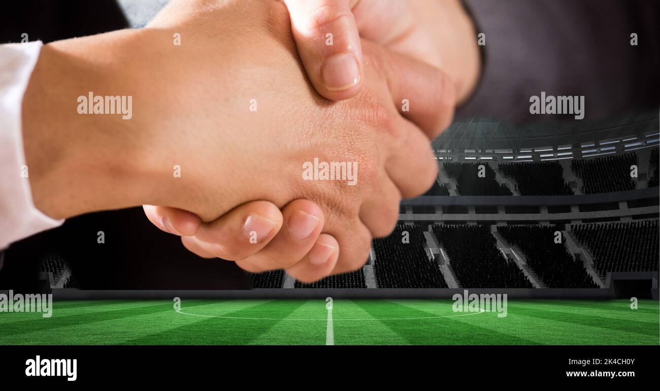 Composition of businessman and businesswoman shaking hands over sports ...