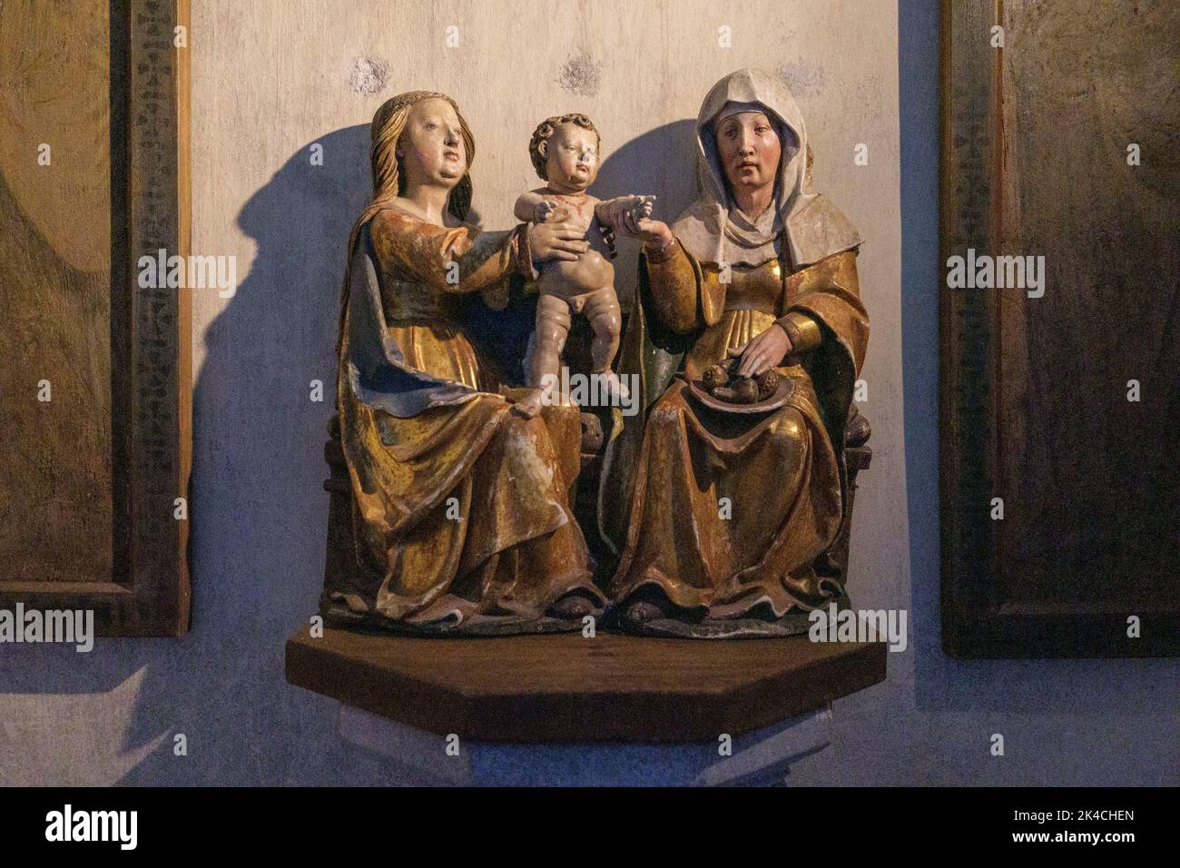 A decoration of statues of two male and a baby inside the Castle Clam ...