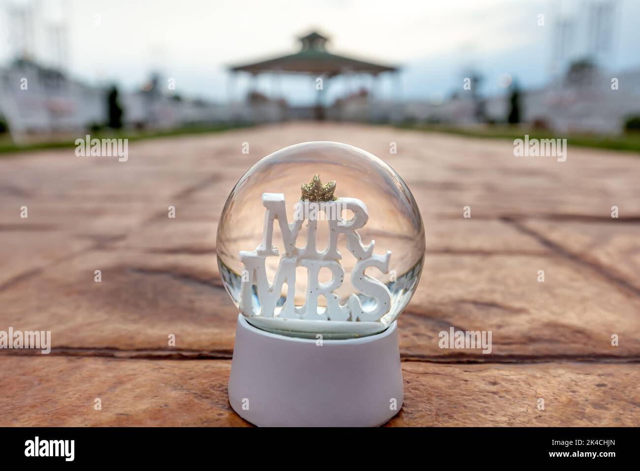 The high-angle close-up view of MR and MRS words in a snowball glass ...