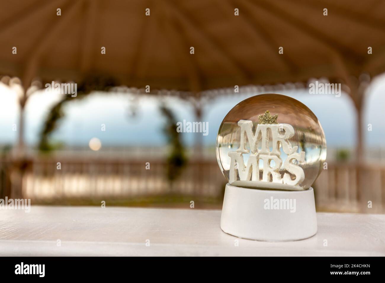 The close-up view of MR and MRS words in a snowball glass - an ...