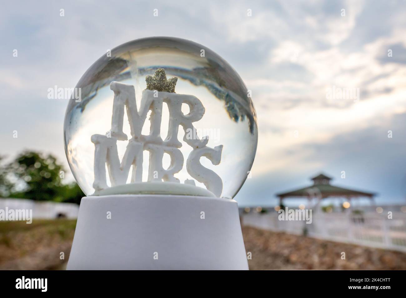 The close-up view of MR and MRS words in a snowball glass - ornamental ...