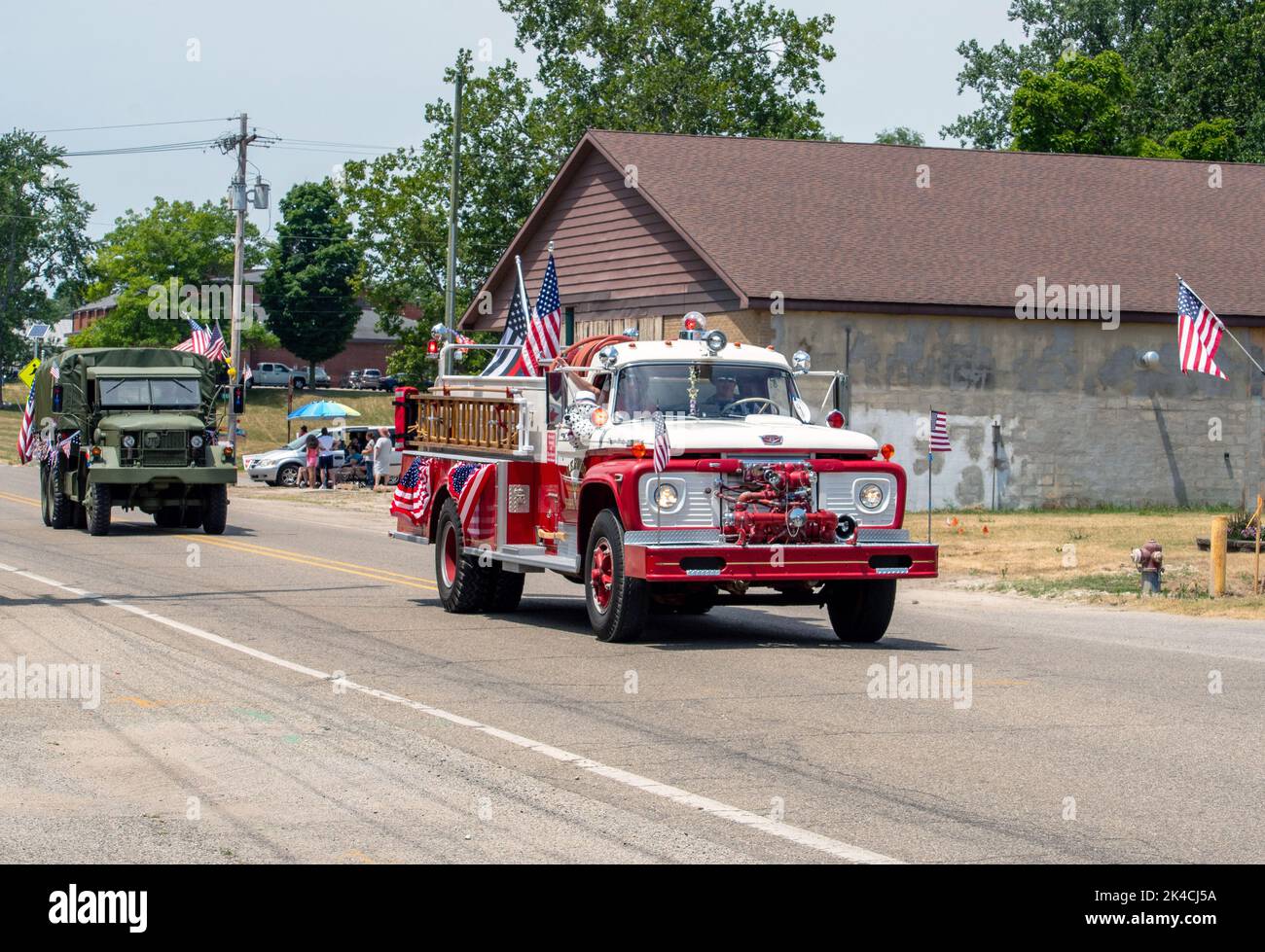 Eau Claire MI USA, July 4 2022, an antique fire engine decked out with ...