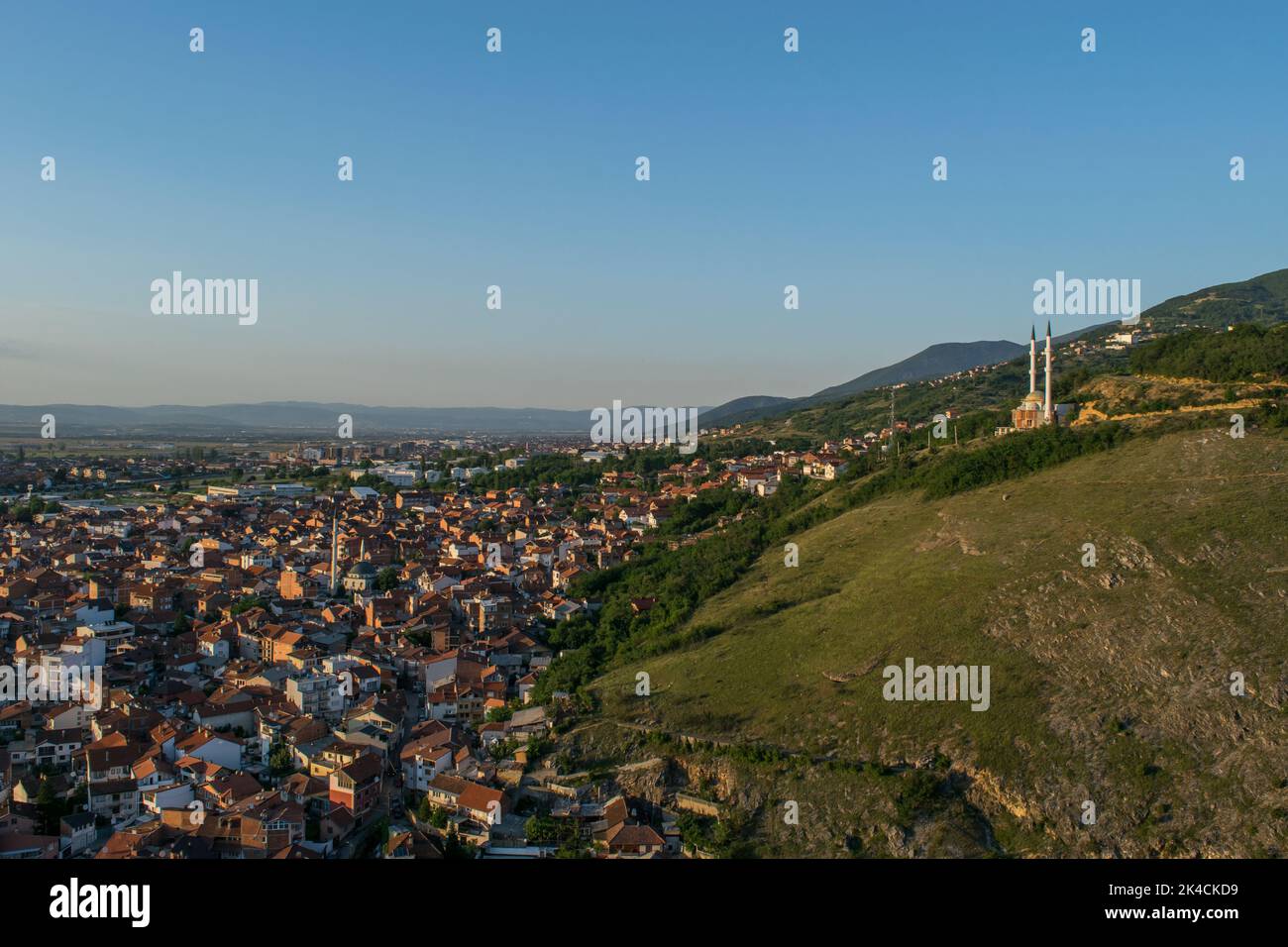Elevated cityscape view of the city of Prizren, Kosovo, during sunset ...