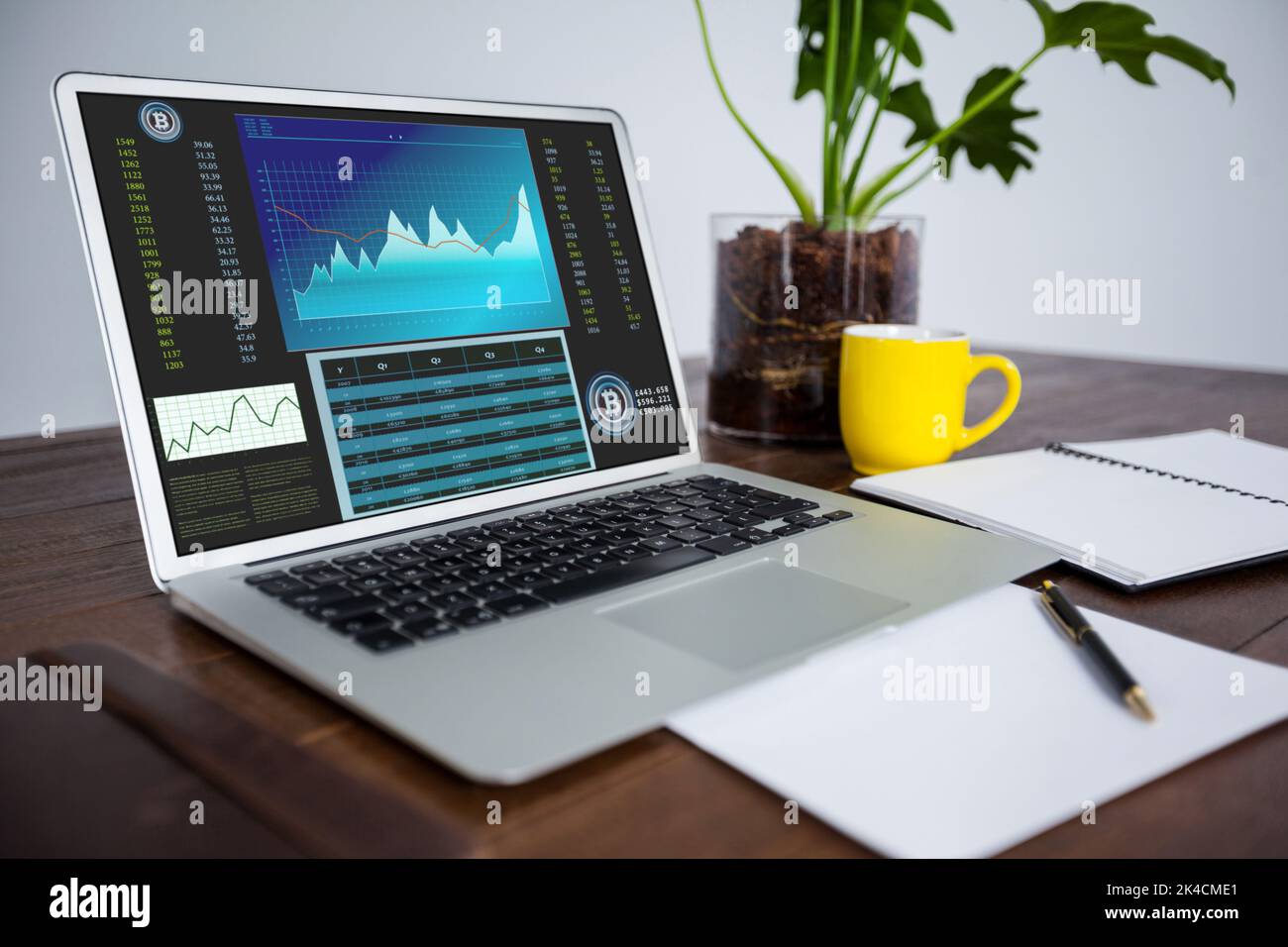 Laptop on desk with statistical data on screen. business communication ...