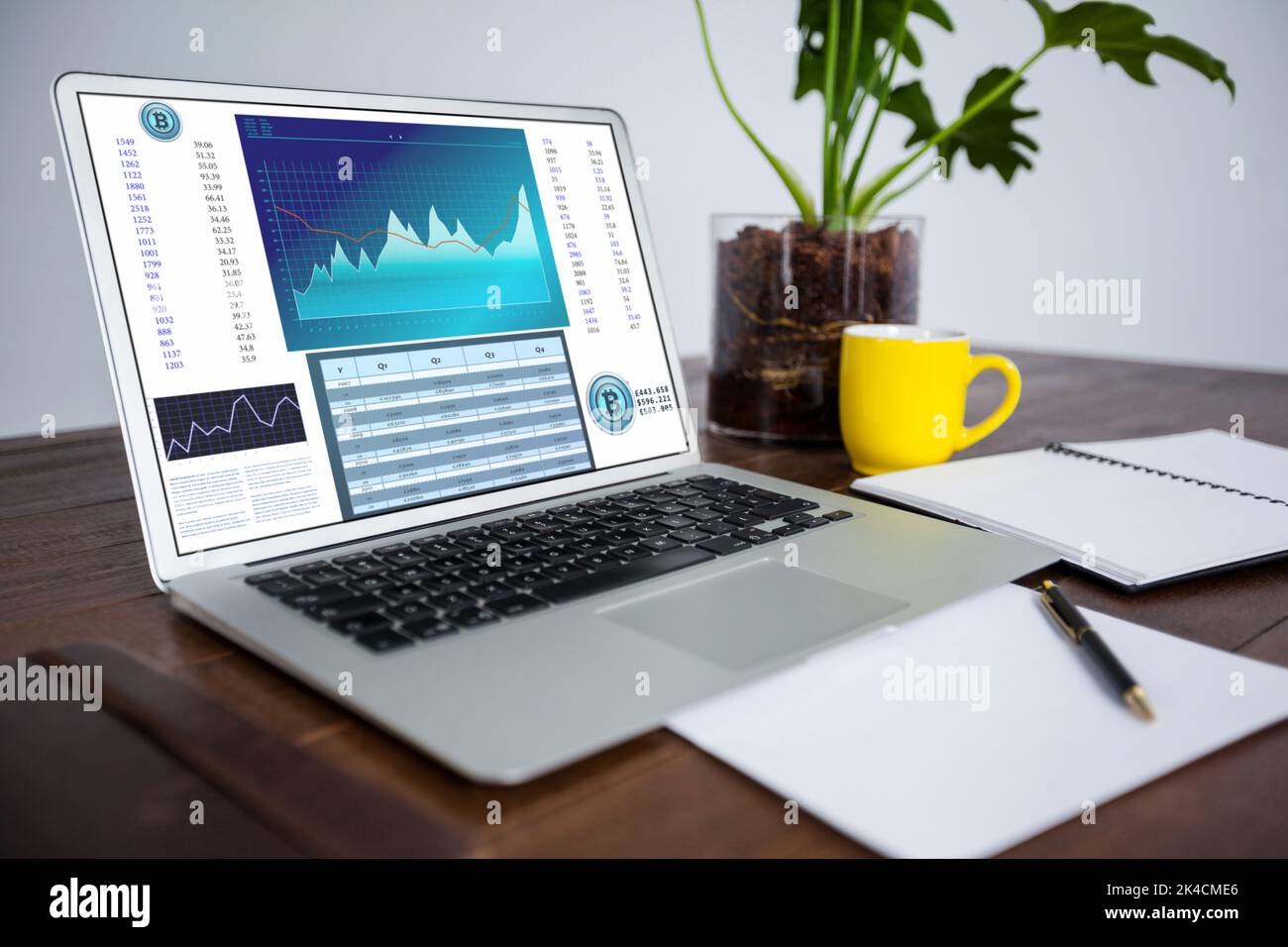 Laptop on desk with statistical data on screen. business communication ...