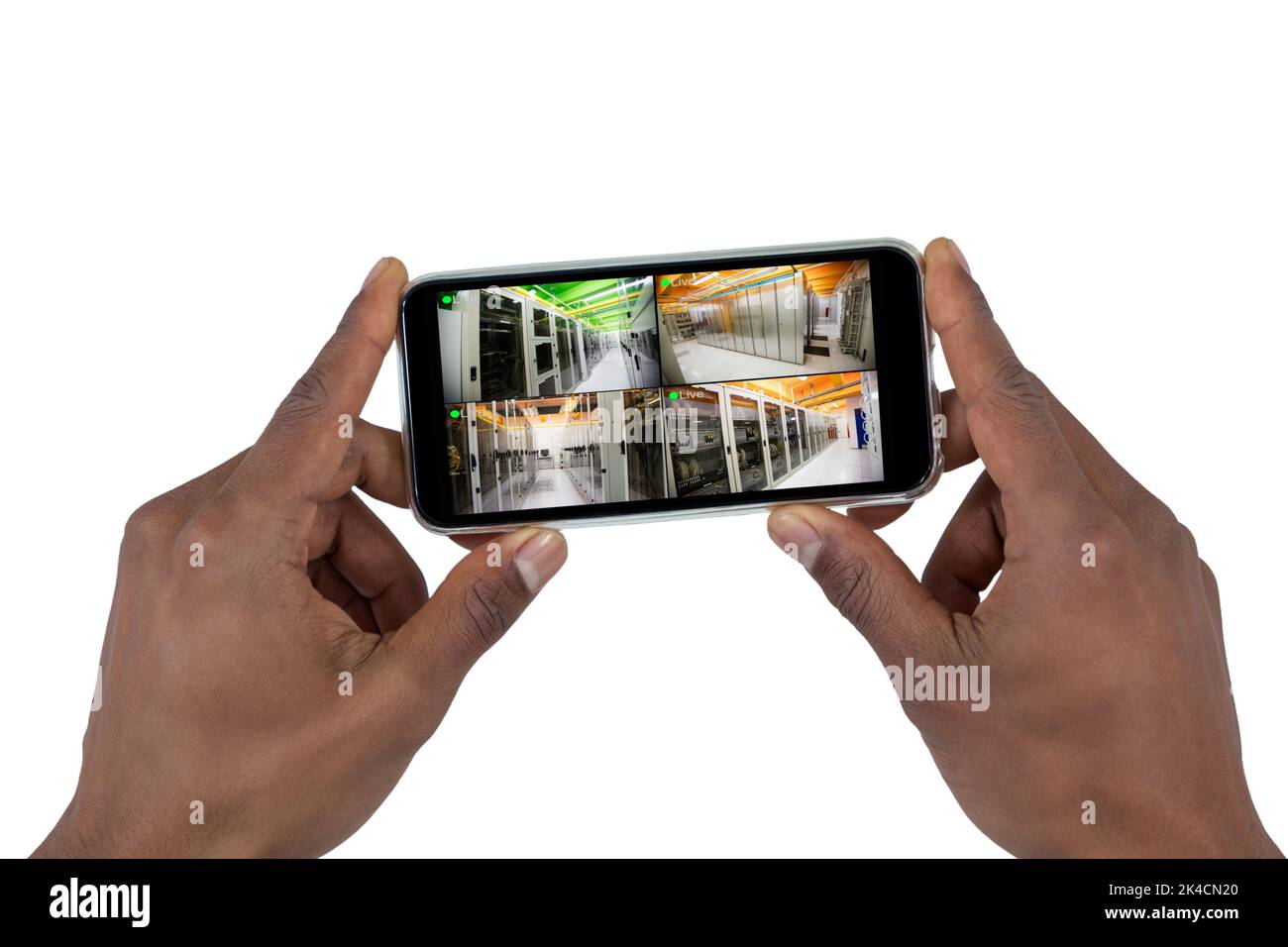 Hand of african american man holding smartphone, security camera views ...