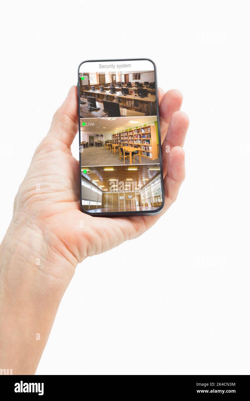 Woman showing black smartphone screen on white background Stock Photo ...