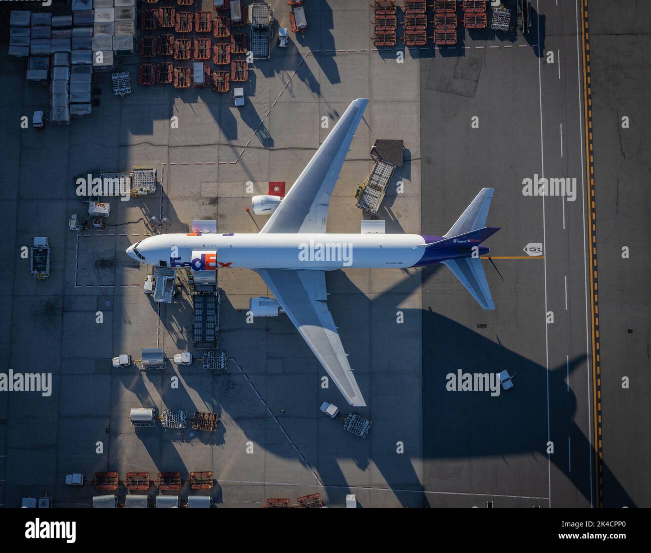 An aerial top shot a FedEx cargo plane being loaded up at Bostons Logan ...