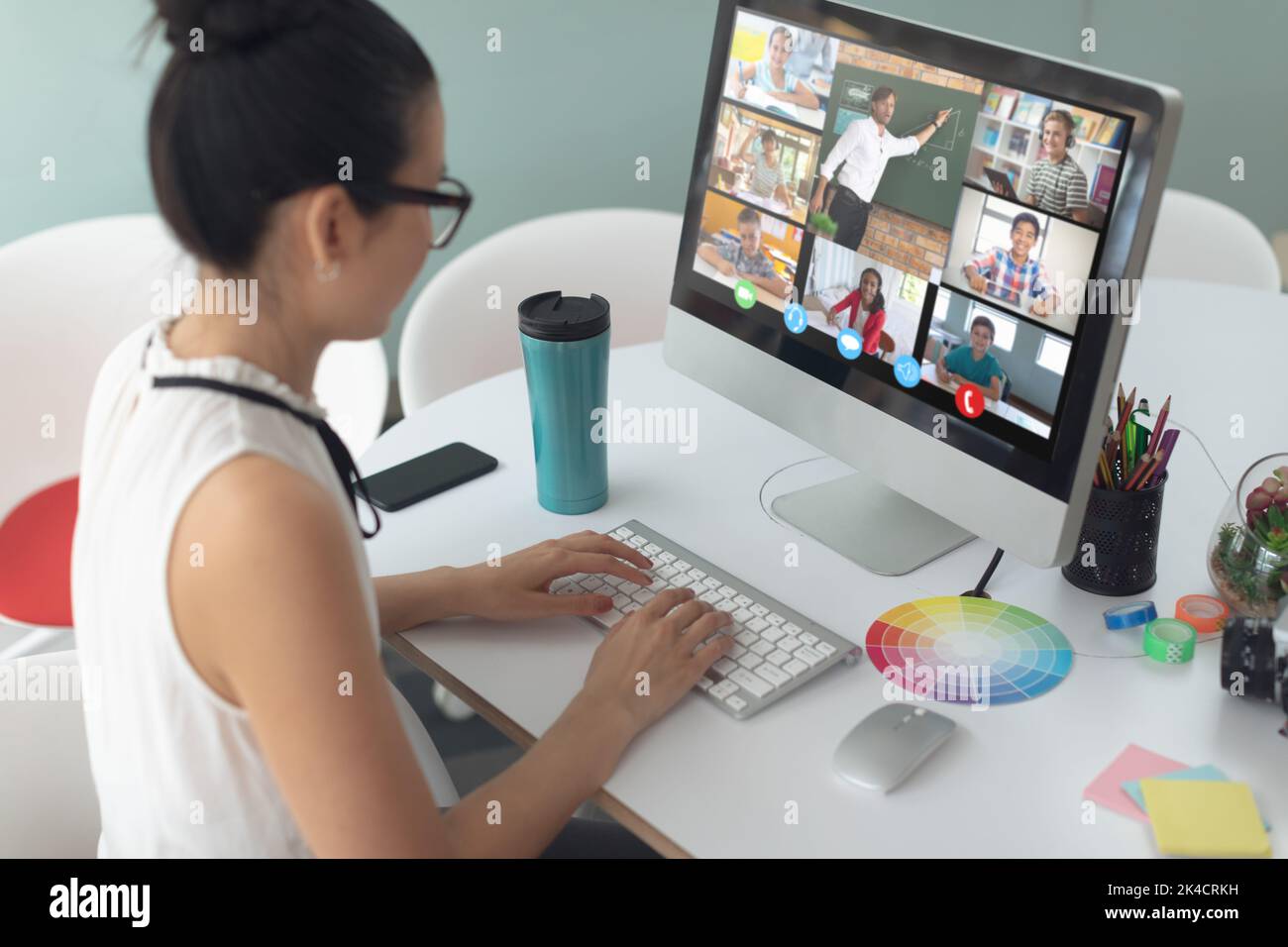 Asian girl using computer for video call, with smiling diverse ...