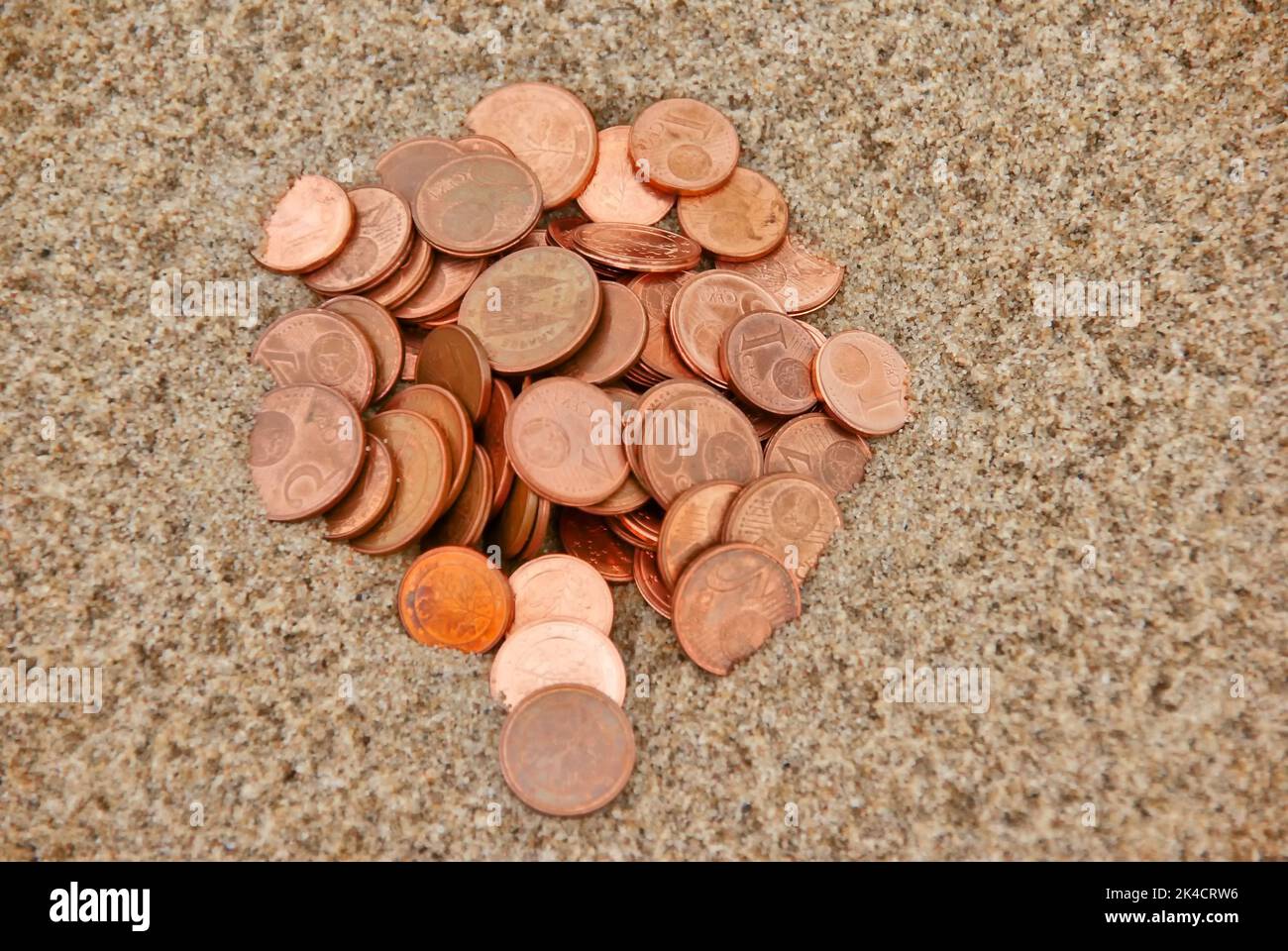 Buried coins hi-res stock photography and images - Alamy