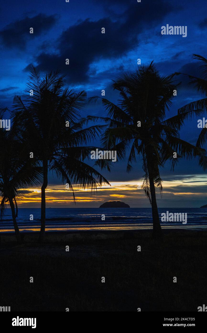 sunset island blue sky high contrast in malaysia Stock Photo - Alamy