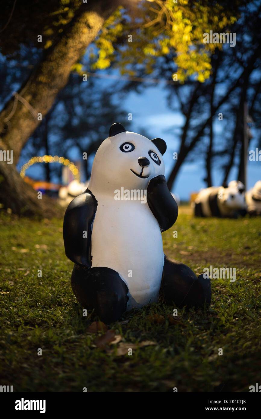 panda at park at night scene in the park at night Stock Photo - Alamy
