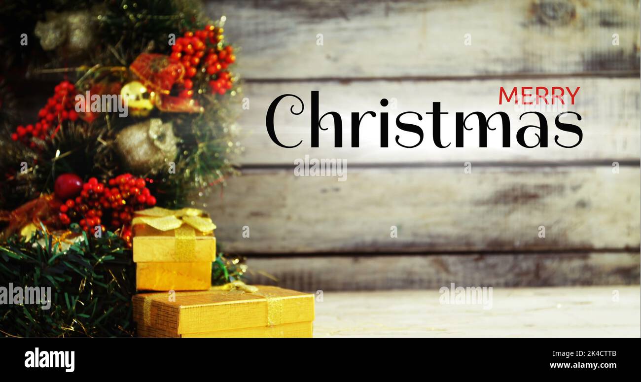 Composition of christmas season's greetings over christmas decoration ...