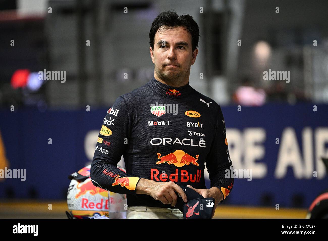 Singapore. 1st Oct, 2022. Red Bull's Mexican driver Sergio Perez reacts after the qualifying ...